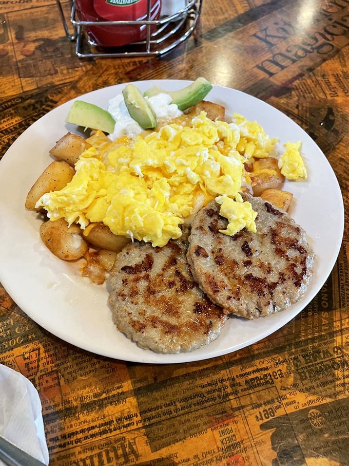 Perfectly scrambled eggs alongside savory turkey sausage patties—proof that simplicity, when done right, is the ultimate sophistication.