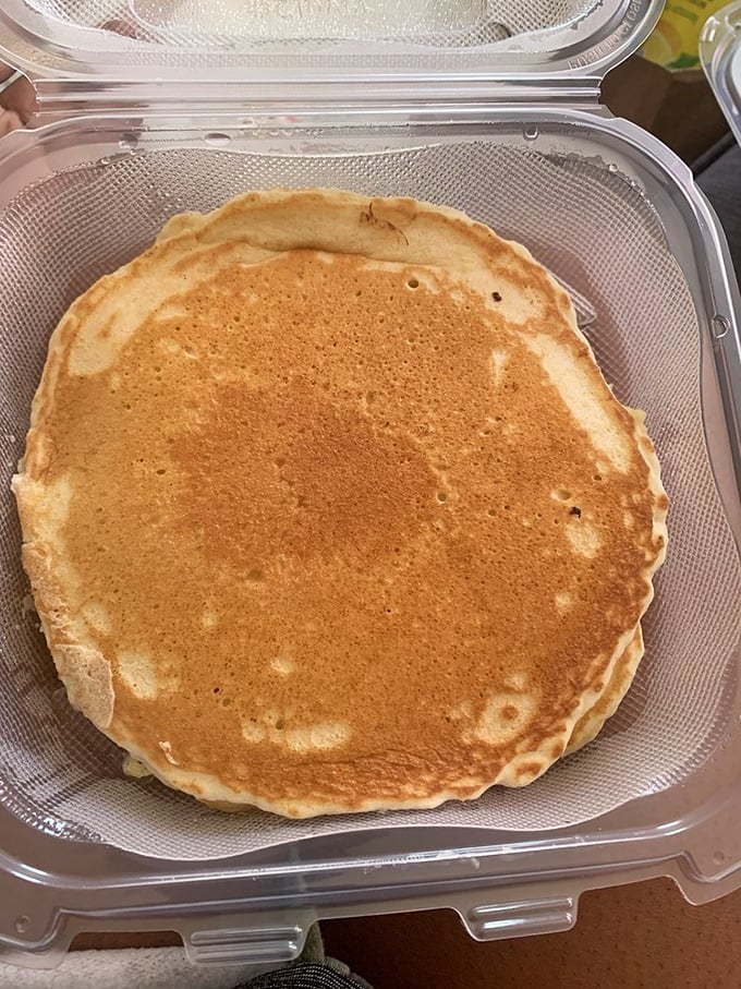Golden-brown perfection in takeout form. Even boxed up, this pancake radiates the promise of butter-soaking, syrup-drizzling happiness.
