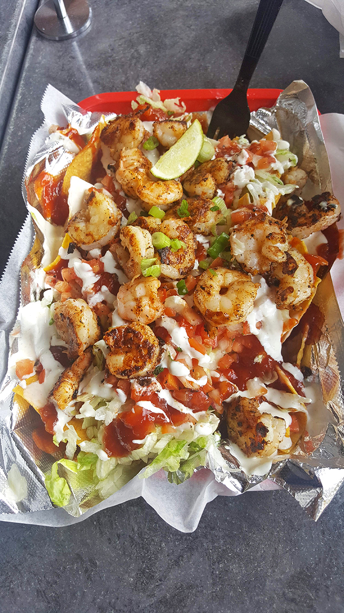 These shrimp nachos aren't just a meal, they're an event. Crispy, creamy, spicy perfection that makes sharing feel like a genuine sacrifice.
