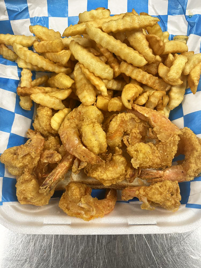 Golden-battered shrimp nestled against crispy fries—a duo that proves landlocked Indiana can deliver seafood worthy of a coastal detour.