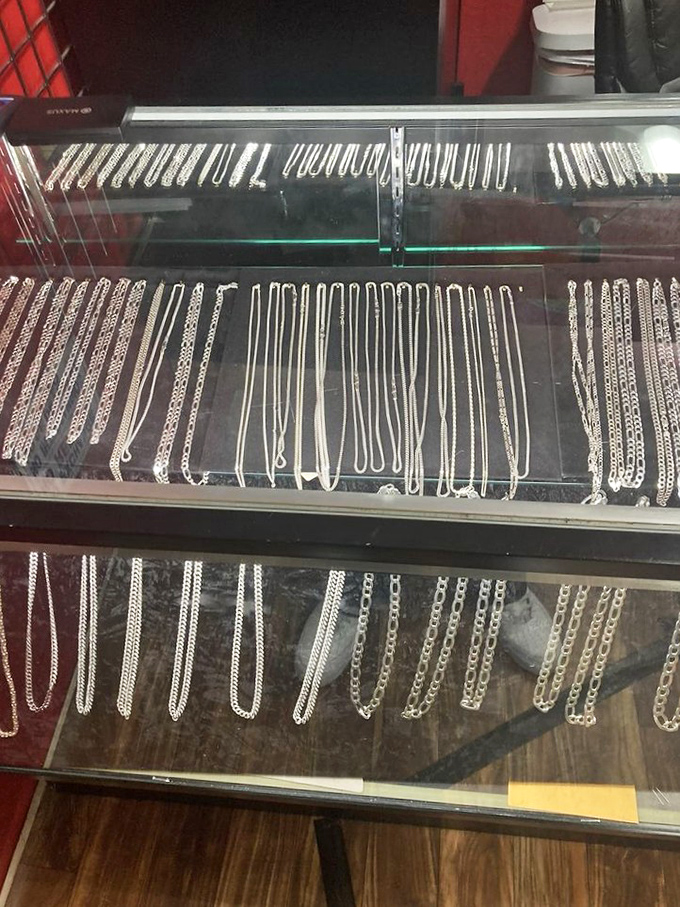 Silver chains gleaming under glass, waiting to adorn necks or wrists. This jewelry case holds affordable bling for every occasion—from quinceañeras to first dates.