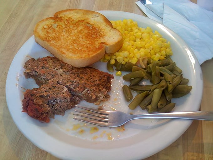 The meatloaf arrives like a love letter to Midwestern cooking—simple, substantial, and served with sides that know their supporting role.