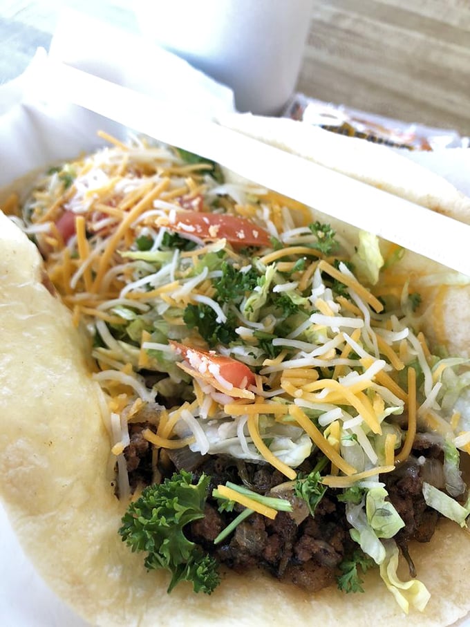 This isn't just a taco; it's a masterclass in generous toppings. That shredded cheese mountain would make any Californian proud.