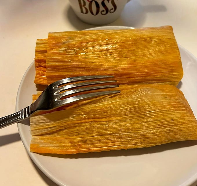 Unwrapping these corn husk-bundled treasures is like opening edible presents. The fork is merely a suggestion—hands work better.