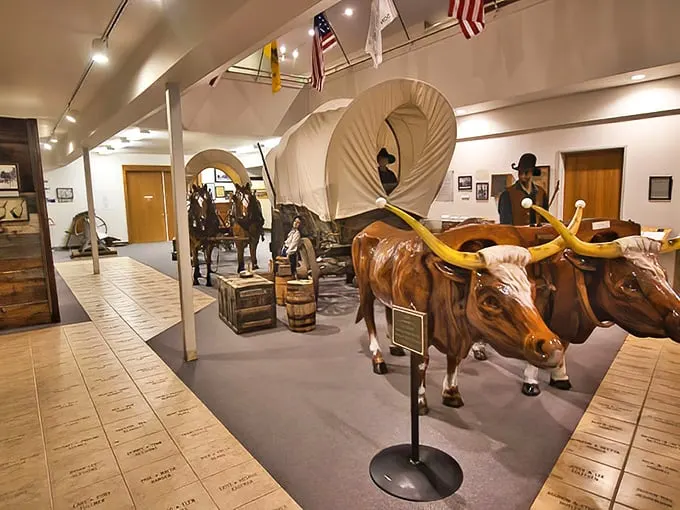 The Teton Valley Historical Museum doesn't just preserve history – it brings it to life. These ox-drawn covered wagons tell the story of pioneers who thought, "Mountains? What mountains?"