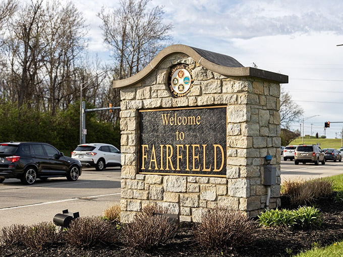"Welcome to Fairfield" indeed! This stone marker isn't just signage—it's the gateway to your blood pressure dropping by at least 10 points.