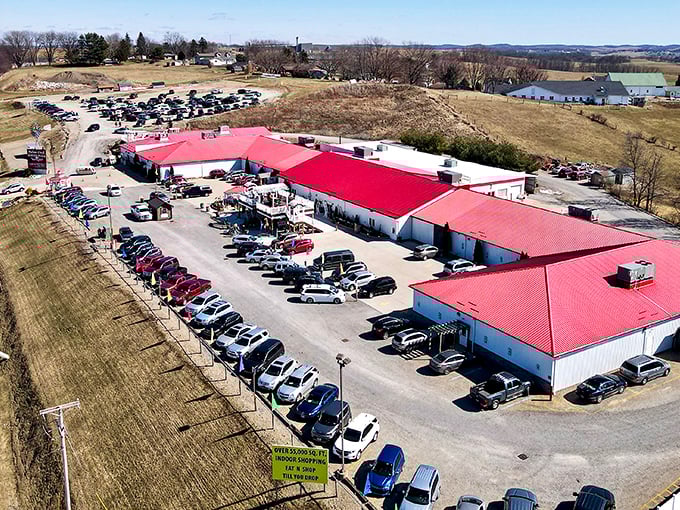 From above, the sprawling red-roofed marketplace looks deceptively orderly. Don't be fooled—inside awaits beautiful retail chaos.