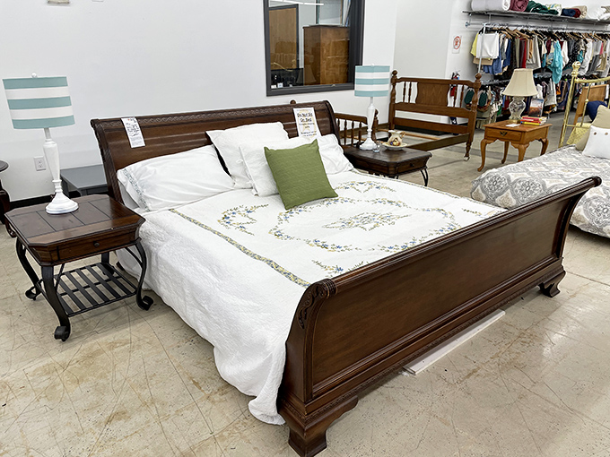 This isn't just a bed—it's a mahogany time machine to an era when furniture was built to outlast civilizations.