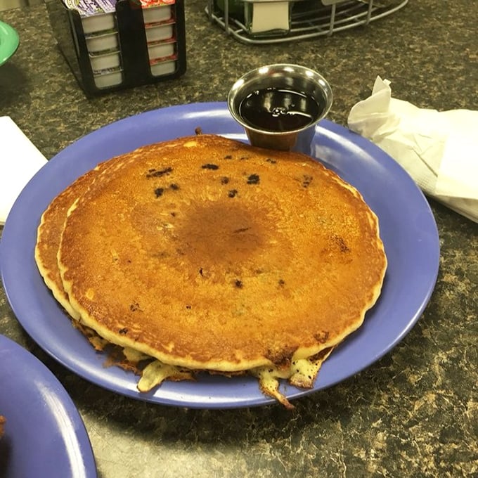 Golden-brown pancake perfection that would make your grandmother both proud and jealous. That little cup of syrup is about to embark on a delicious journey.