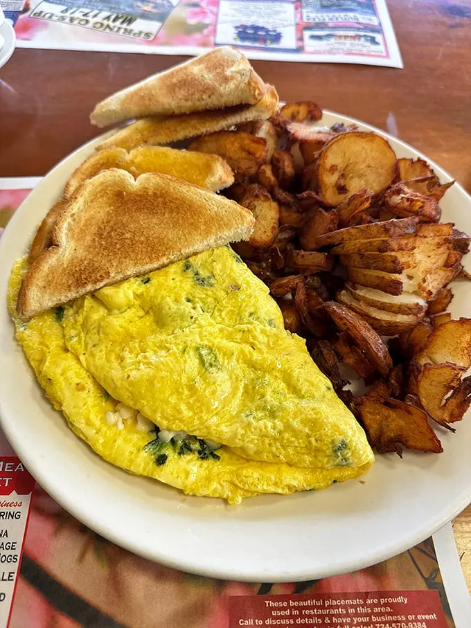 This perfect omelet and home fries combo isn't just breakfast – it's edible therapy that makes Monday mornings bearable again.