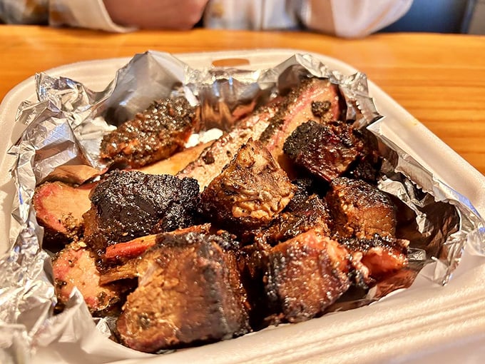 These ribs don't just fall off the bone—they practically leap into your mouth, leaving behind a trail of smoky memories and sticky fingers.