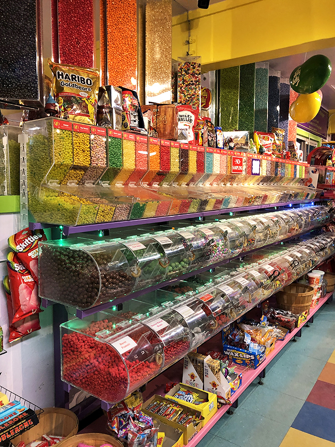 The candy wall—where self-control goes to die and childhood memories come flooding back faster than you can say "one of each, please."