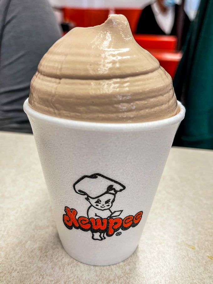 The chocolate malt arrives like a creamy mountain of nostalgia in a cup, promising the kind of satisfaction no trendy milkshake can match.