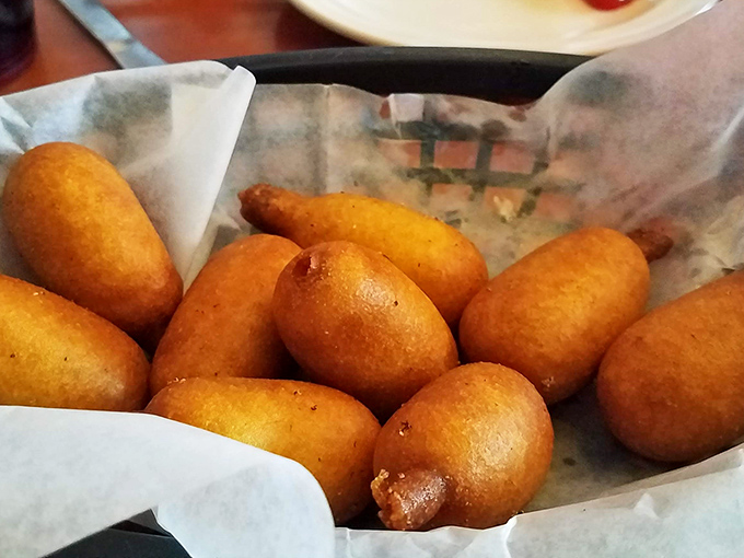 Golden-brown corn dog bites that would make state fair vendors jealous. Crispy outside, fluffy inside—simple pleasures elevated to art form.