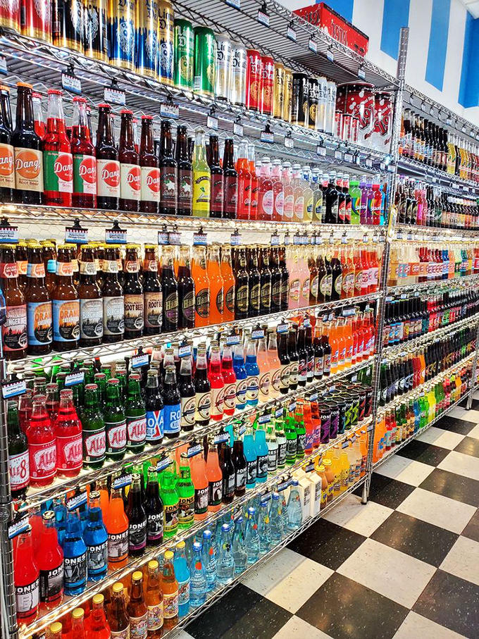The wall of craft sodas stands like a liquid rainbow—hundreds of glass bottles promising flavor adventures from nostalgic root beer to dare-devil bacon soda.