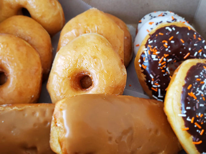 Donut perfection doesn't happen by accident. These golden-fried beauties with their chocolate-dipped tops are what breakfast dreams are made of.