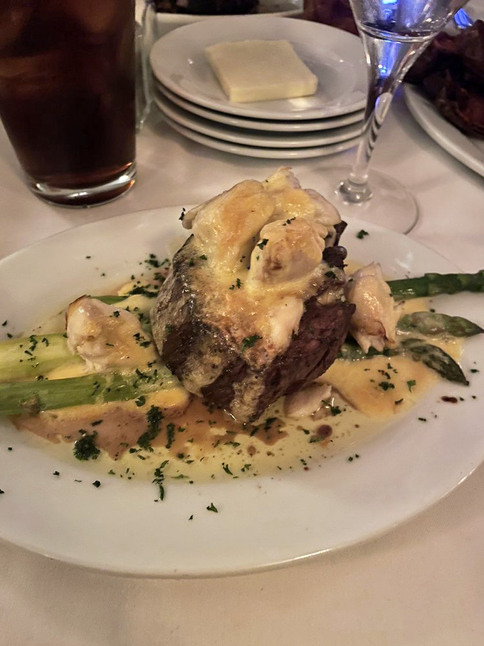Surf meets turf in perfect harmony—a tender filet crowned with succulent crab and asparagus. Whoever said "you can't have it all" clearly never dined here.
