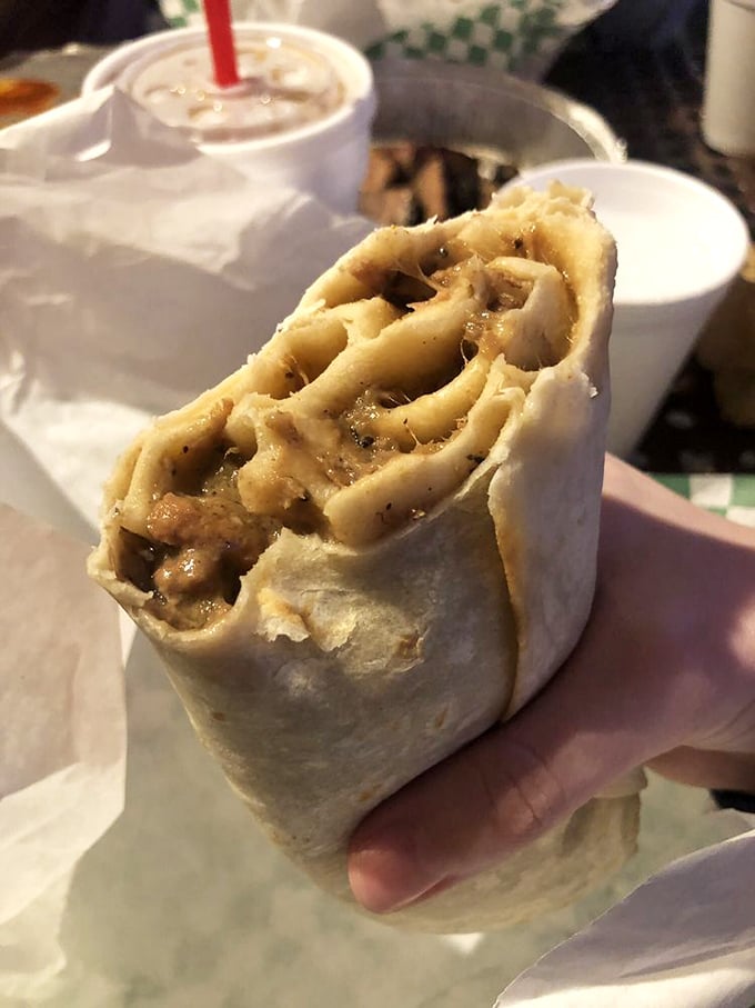 Behold the almighty green chili burrito! That perfect tortilla cylinder contains enough flavor to make you question all your previous burrito relationships.