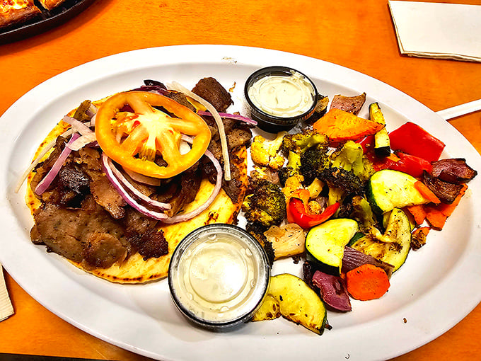 This isn't just a gyro—it's a Mediterranean masterpiece with perfectly seasoned meat, fresh vegetables, and tzatziki sauce worth writing home about.