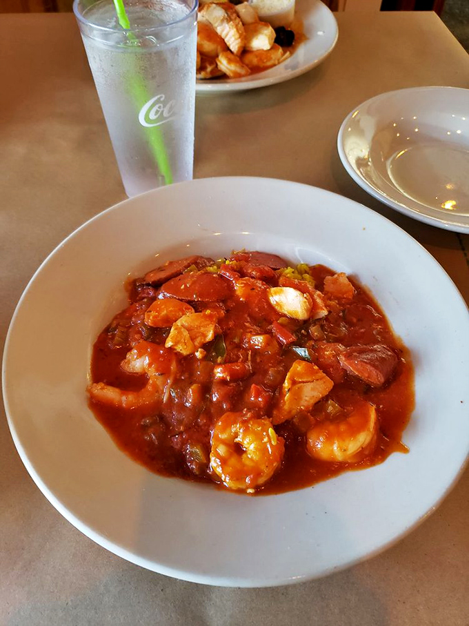 This jambalaya isn't just a dish, it's a spicy seafood party where shrimp and andouille sausage are the guests of honor.