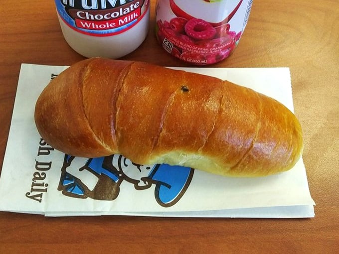 This kolache isn't just breakfast, it's edible architecture – a perfect balance of pillowy dough and savory filling that puts ordinary breakfast sandwiches to shame.