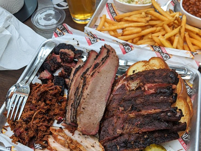 Behold, the carnivore's dream team. This tray of smoked perfection is what barbecue fantasies are made of – notice the perfect pink smoke ring.
