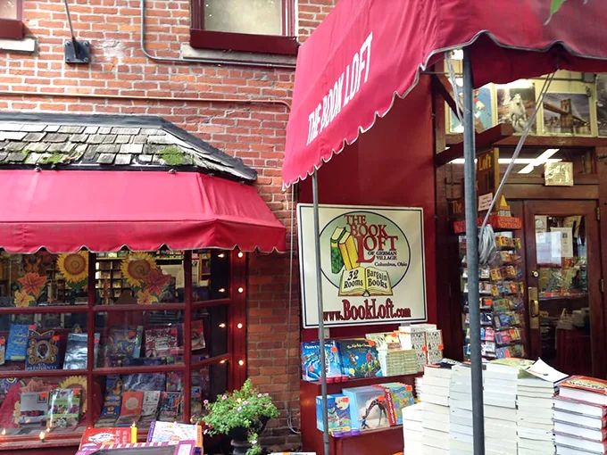 The Book Loft's charming exterior proudly announces its identity with vintage signage. That "32 rooms" isn't hyperbole—it's a reader's paradise mapped out in brick.