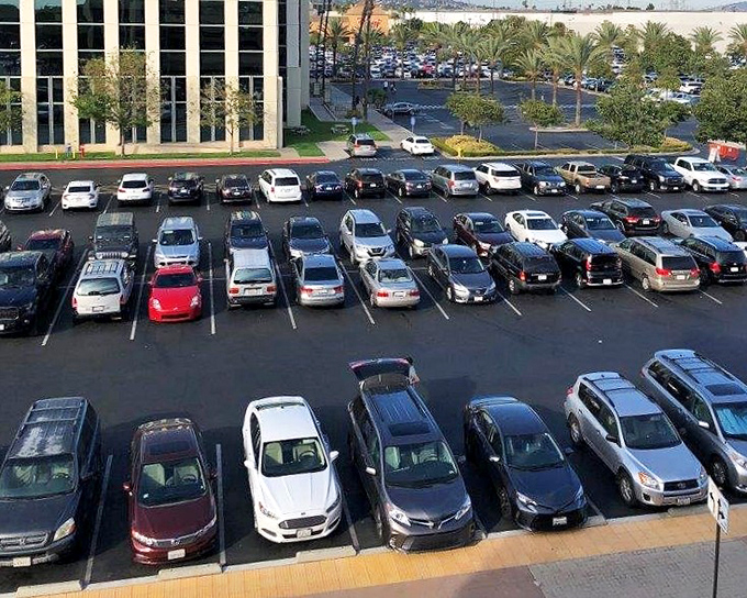 Parking paradise or concrete jungle? The Citadel's vast lot fills with vehicles of determined shoppers ready for retail adventure.
