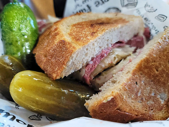This isn't just a sandwich; it's a masterpiece of pastrami architecture where each layer plays its part in perfect harmony.
