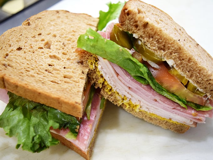 Behold the architectural marvel that is a proper deli sandwich – layers of goodness that make you wonder why you ever settled for drive-thru fare.