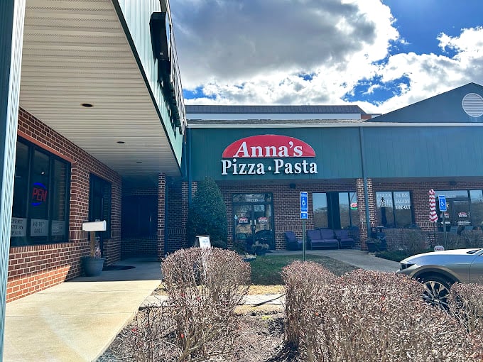 Anna's brick facade and classic signage hint at the traditional Italian comfort waiting just beyond those doors.