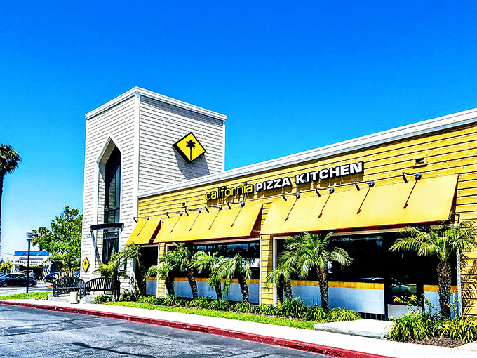 California Pizza Kitchen's sunny yellow awnings match the Long Beach vibe perfectly. Palm trees and pizza – a California dream come true.
