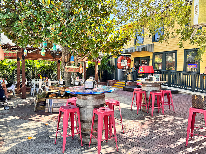 Old-school charm under ancient trees. DJ's outdoor seating invites you to linger over lobster rolls while watching Duval Street's parade of characters.