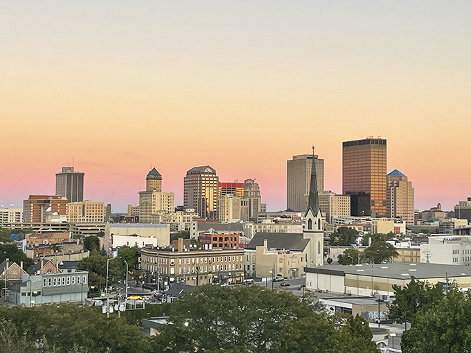 Dayton's skyline glows with warm hues during a picture-perfect sunset. The city that taught the world to fly now offers views worth staying grounded for.