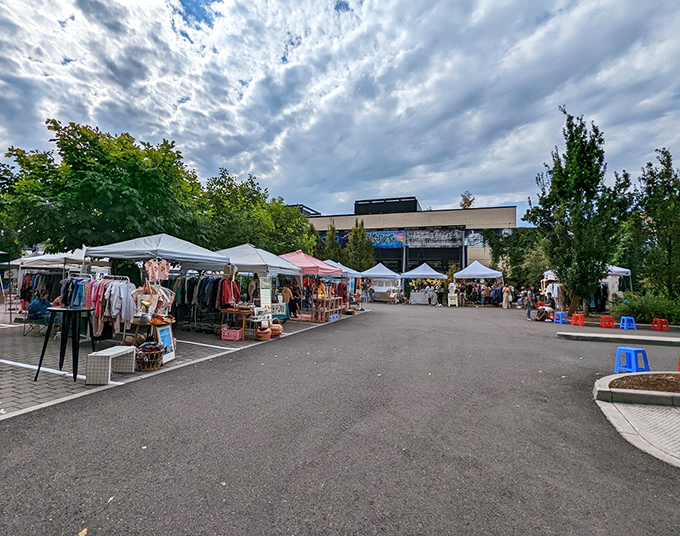 Street market magic happens here, where vintage meets modern under Portland skies - pure shopping theater!