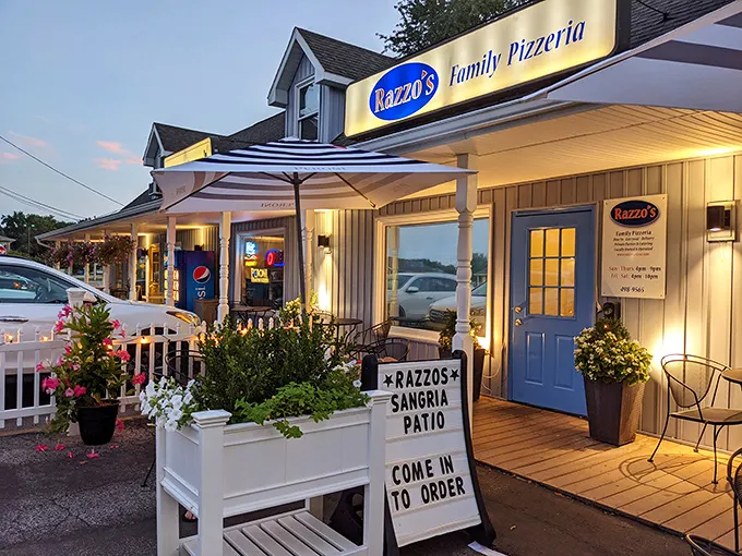 Razzo's charming cottage exterior feels like Grandma's house—if Grandma happened to make spectacular pizza and sangria.