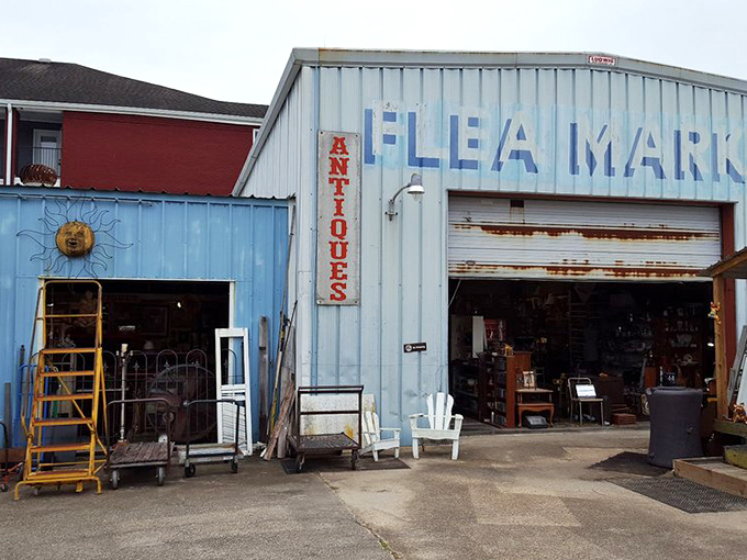 The welcoming red exterior of River Road Flea Market hints at the personality-packed treasures waiting to be discovered inside.