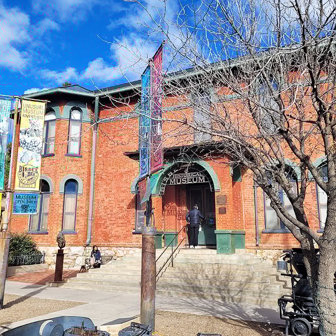 Colorful banners welcome visitors to the Bisbee Mining Museum, where copper was king and fortunes were made and lost.