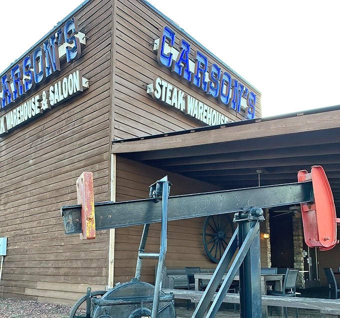 That blue sign isn't just announcing Carson's—it's a beacon for steak lovers who appreciate substance over style.