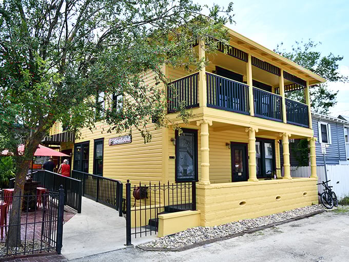 Those barrel tables aren't just cute—they're the perfect perch for devouring clam strips while soaking in Key West's quirky energy.