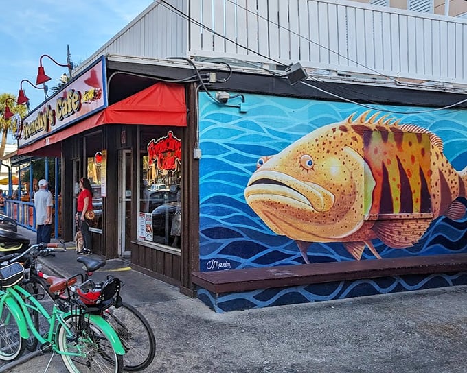That giant grouper mural isn't just art – it's a delicious warning of what's swimming onto your plate at Frenchy's.