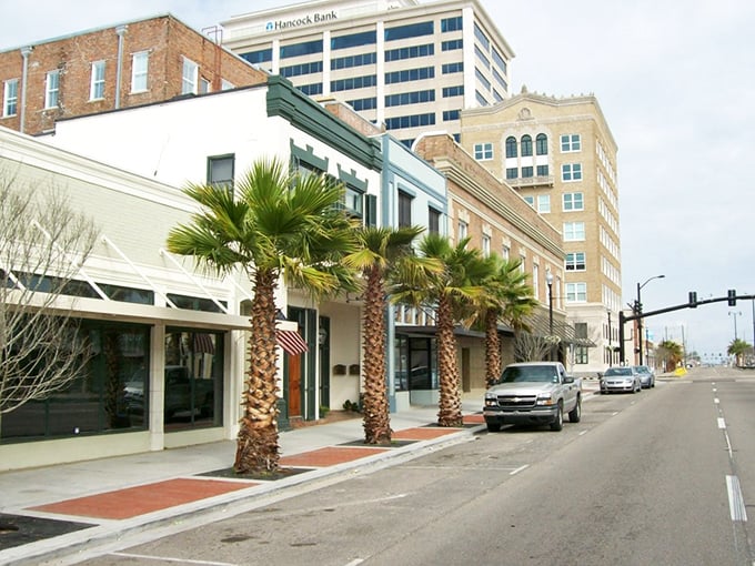 Palm trees and historic buildings create Gulfport's unique coastal character – affordable seaside living that doesn't wash away your savings.