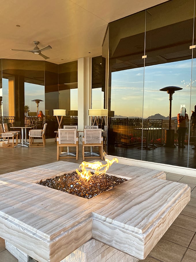 That fire pit isn't just for ambiance—it's nature's way of telling you to settle in for a steak experience as memorable as the mountain views.