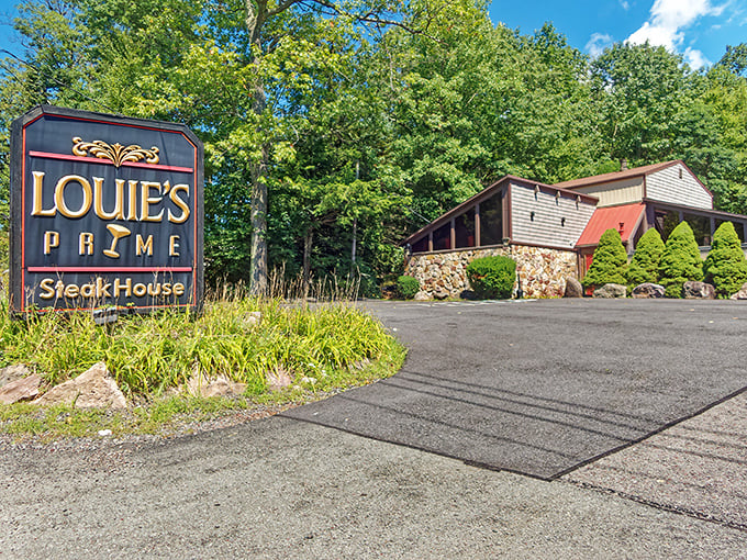 That rustic-elegant sign promises what the building delivers – a woodland retreat where prime steaks are the main attraction.