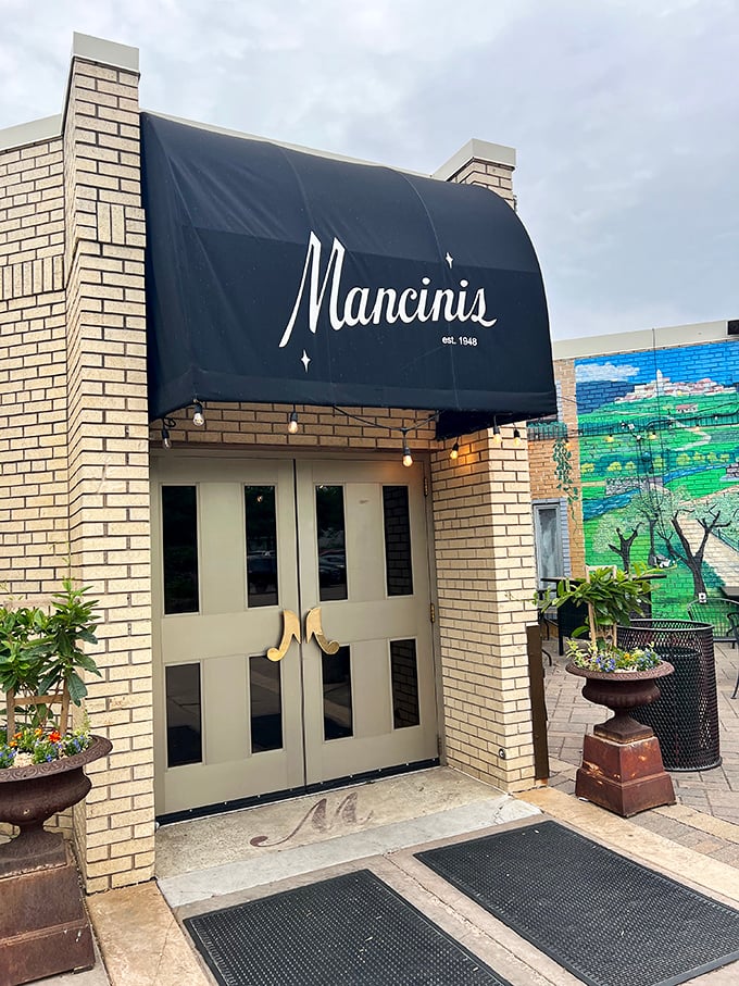 The beautiful patio at Mancini's features a stunning mural that's almost as impressive as their steaks. Almost.