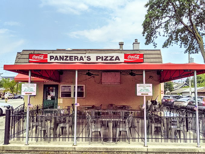 The outdoor seating at Panzera's – where summer nights, cold drinks, and perfect pizza create memories warmer than their ovens.