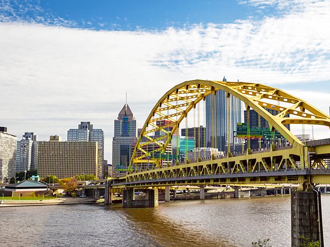 The iconic yellow bridges of Pittsburgh frame the city's skyline like golden gateways. When they light up at night? Pure magic.