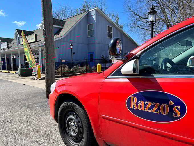 That delivery vehicle isn't just carrying pizzas—it's transporting happiness on a circular crust to lucky Rochester residents.