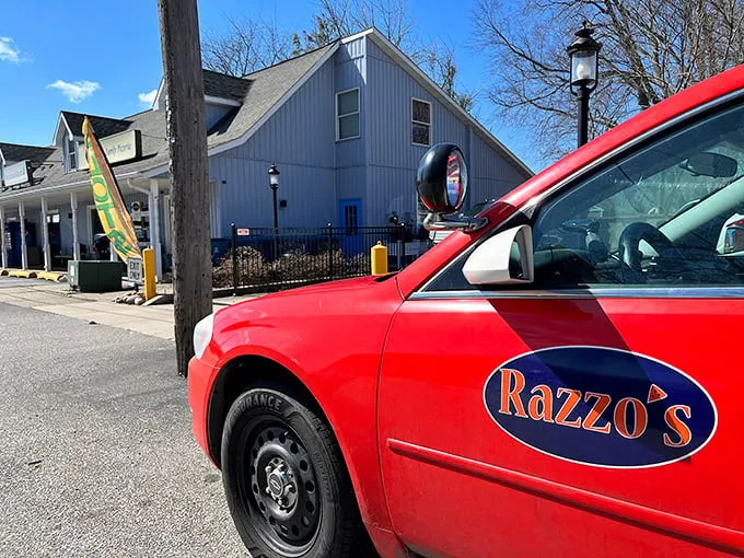 That delivery vehicle isn't just carrying pizzas—it's transporting happiness on a circular crust to lucky Rochester residents.