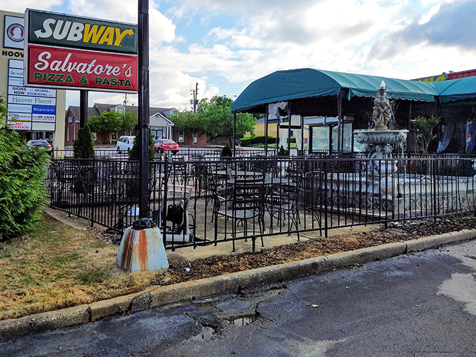 That outdoor seating area isn't just a place to eat—it's where memories are made, one perfect slice at a time.